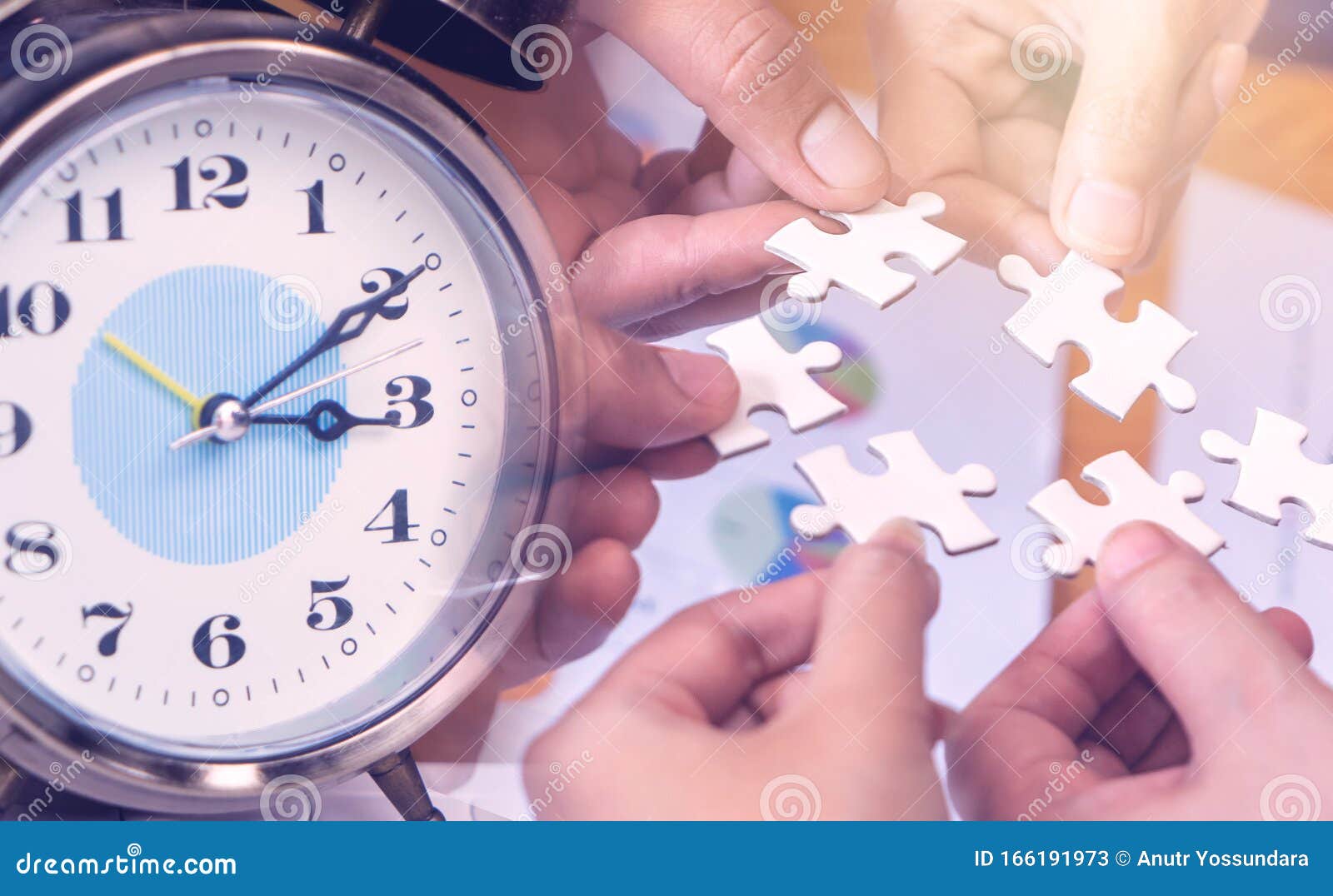 Clock Counting Deadline with Team Putting Up Jigsaw for Business ...