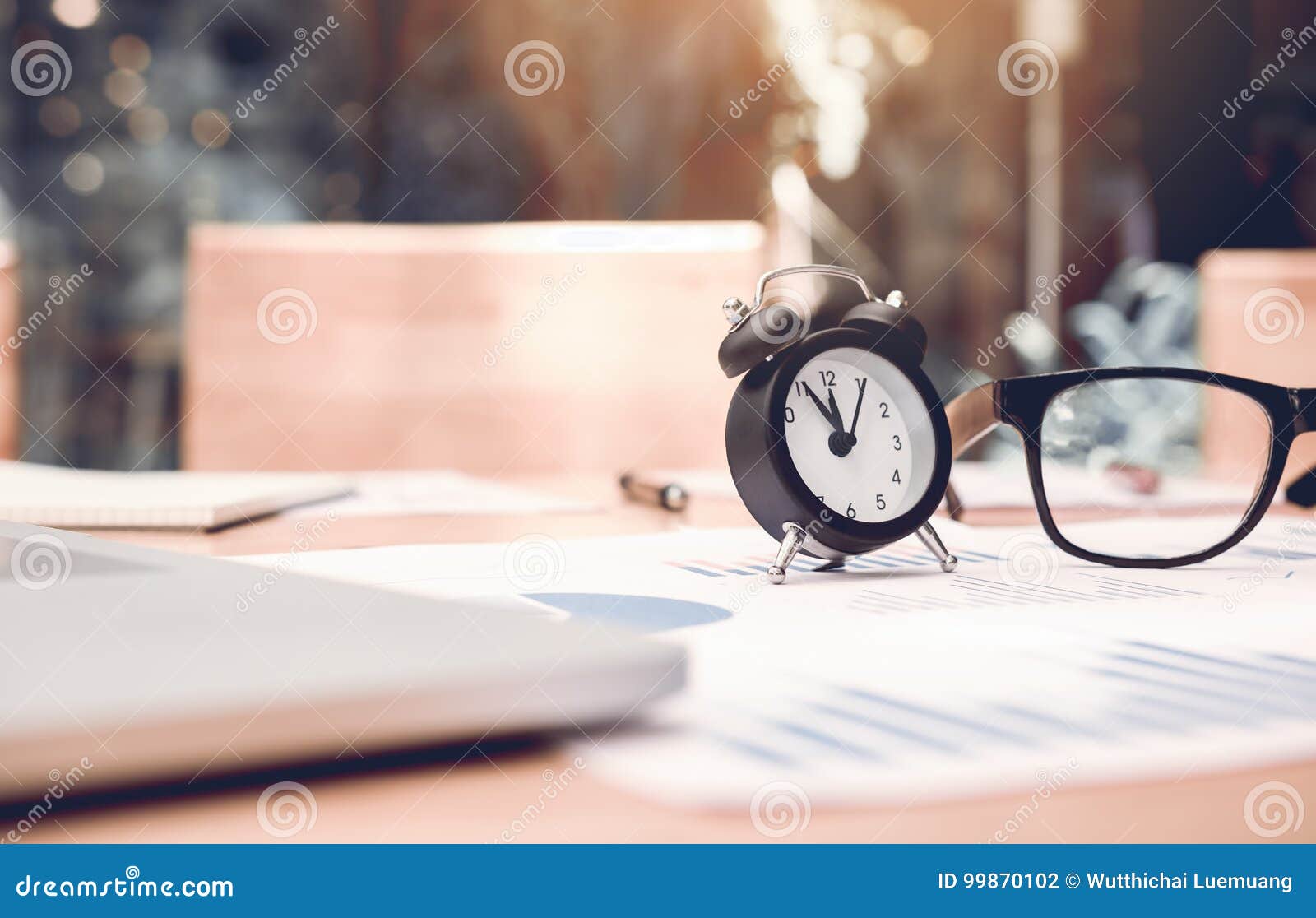 Clock on desk office room. stock photo. Image of computer - 99870102