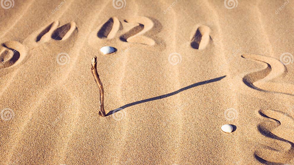 Clock dial in sand stock image. Image of hours, textured - 47773709