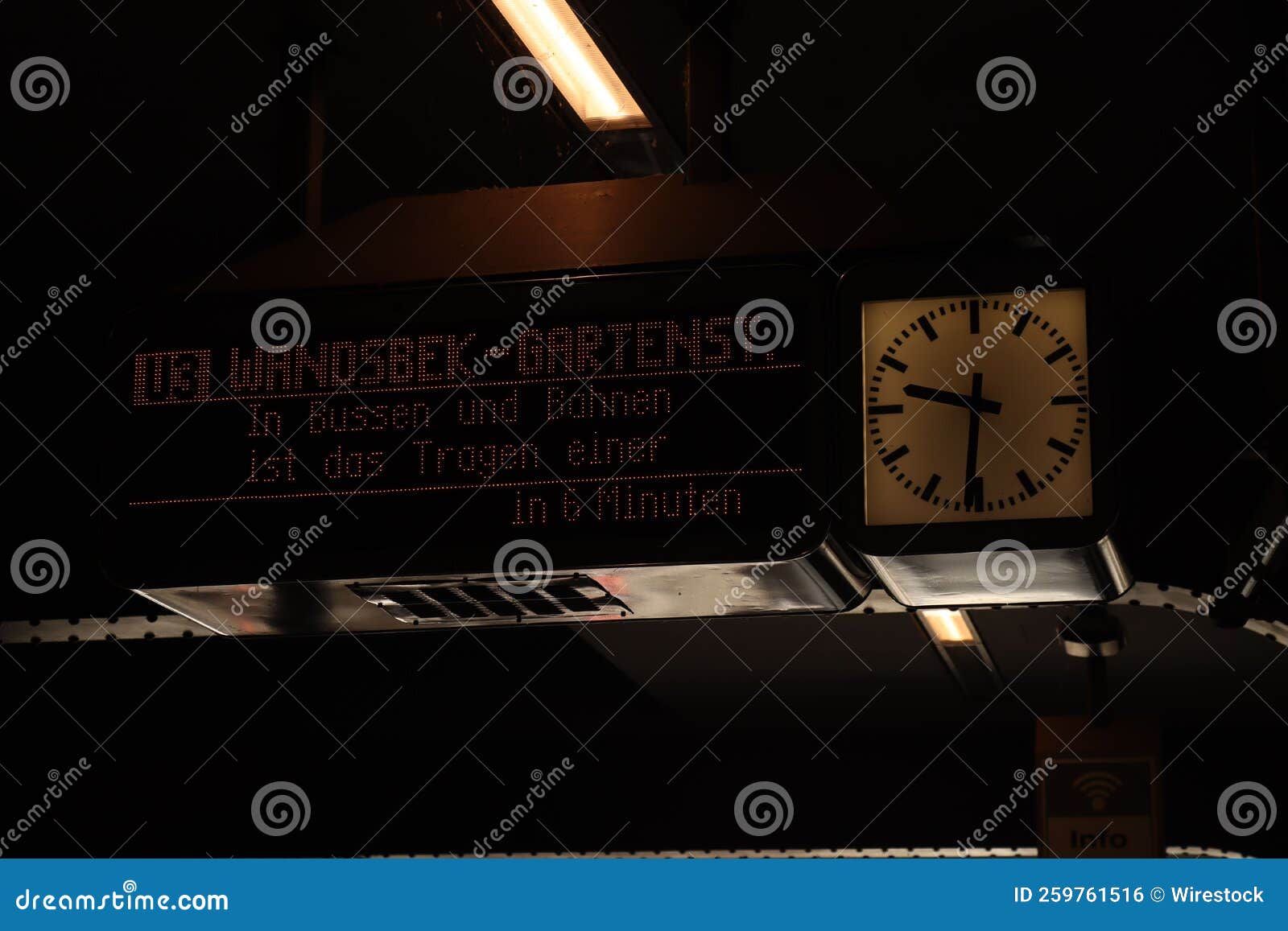 Clock and the Digital Timetable in a Station Stock Photo - Image of ...
