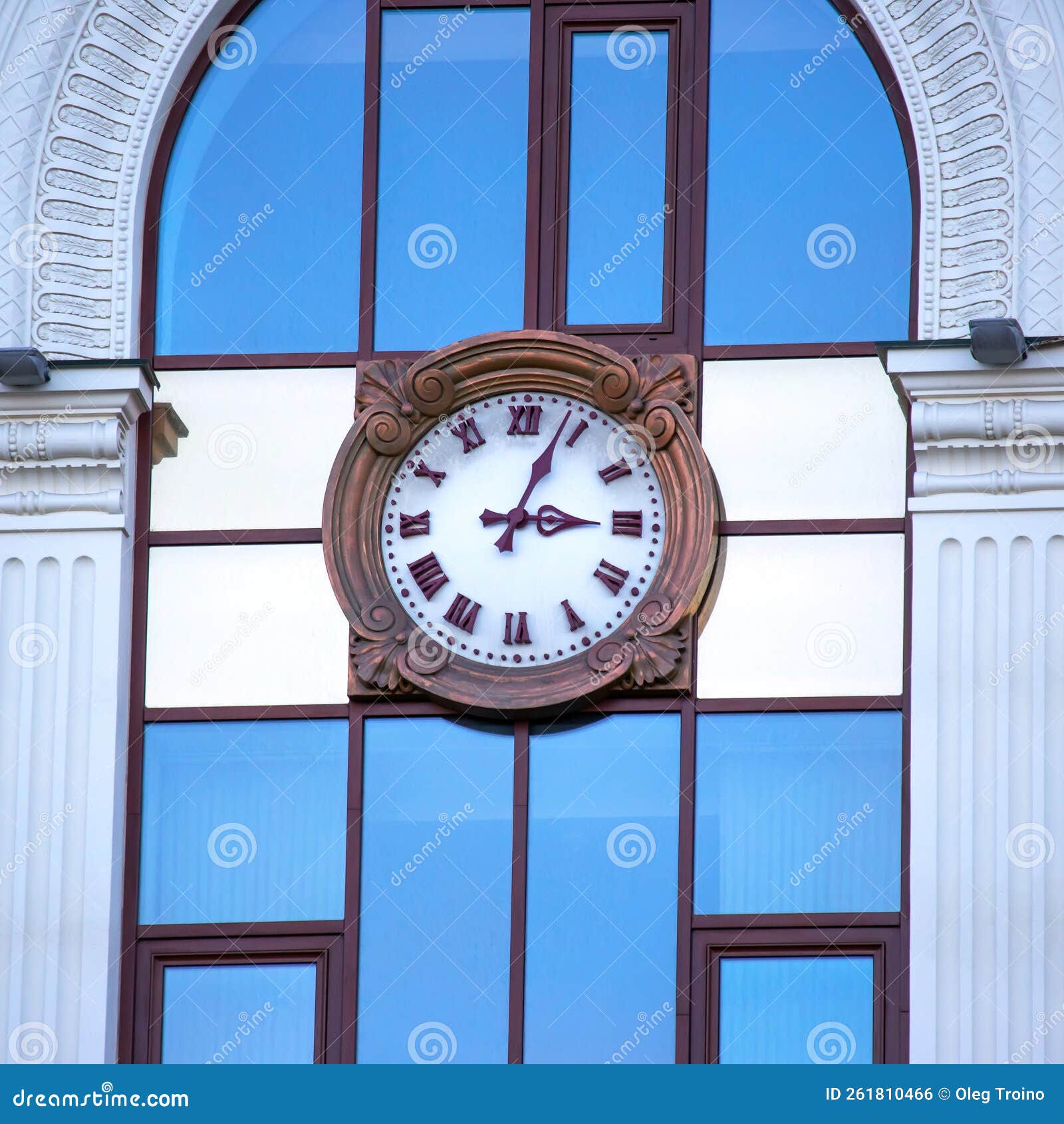 Clock on the Facade of a Building with Windows Stock Photo - Image of ...