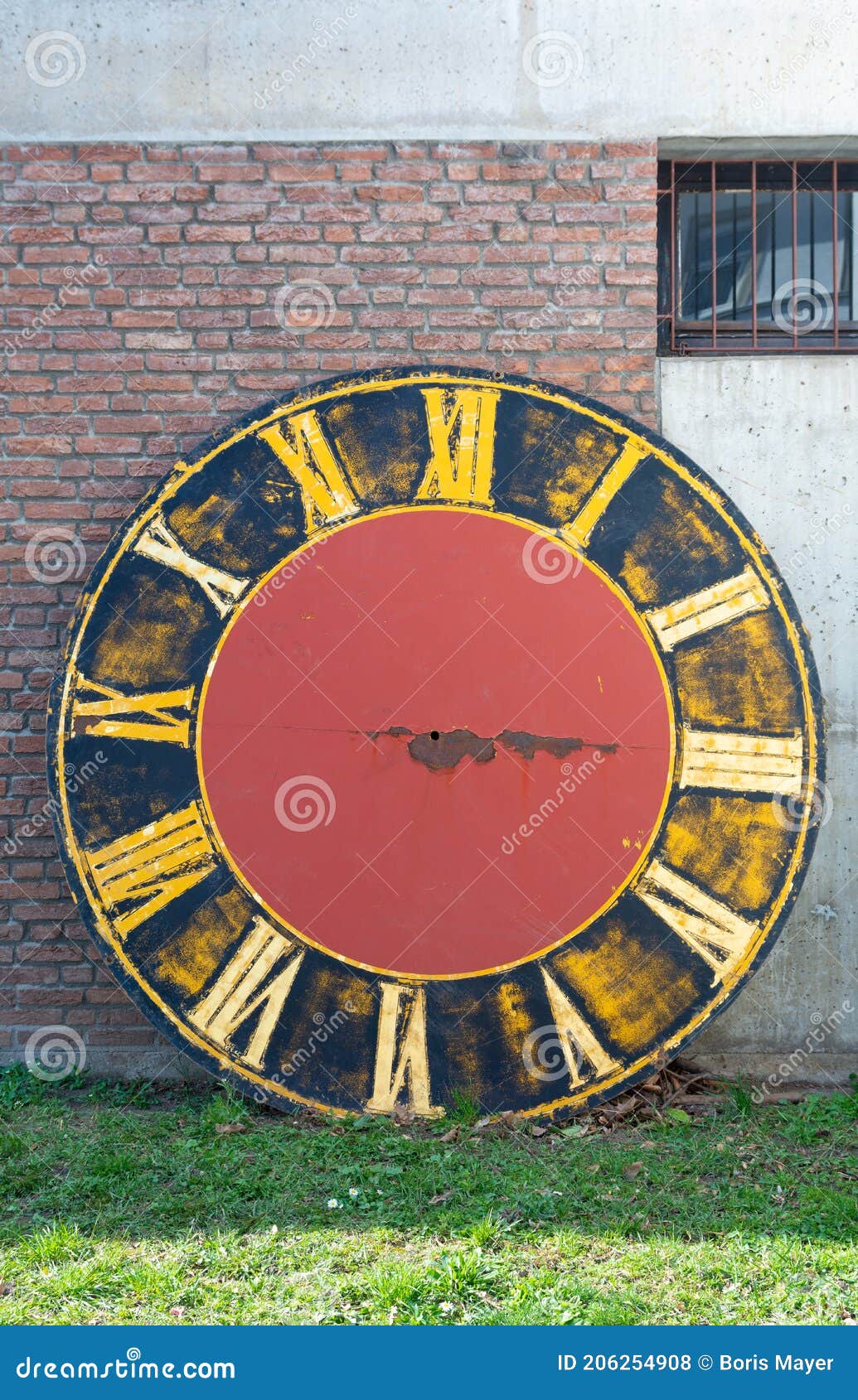 Clock Face of a Big Clock, Leaning on a Wall Stock Photo - Image of ...