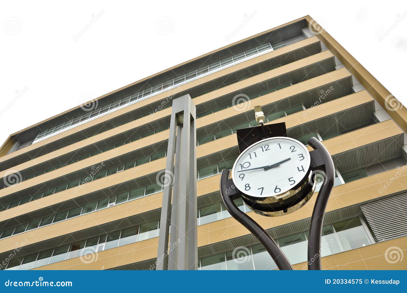 Clock in front of building stock image. Image of high - 20334575