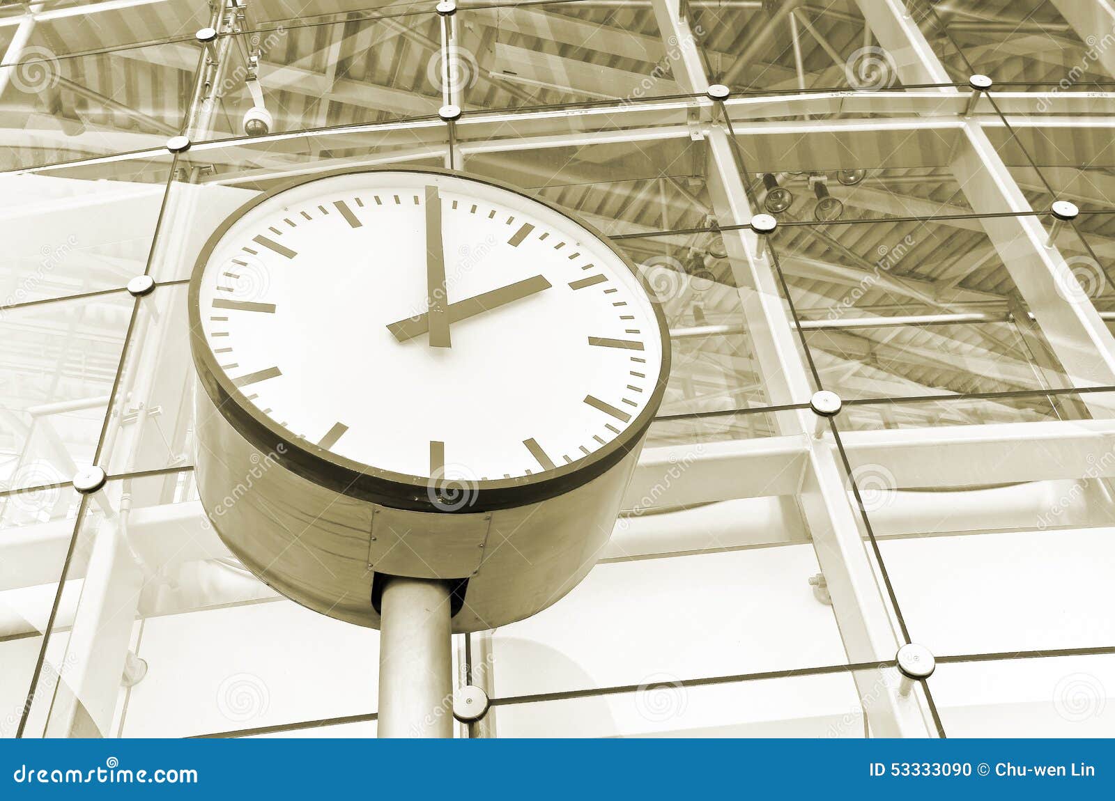 Clock in Front of an Office Building Stock Photo - Image of black ...