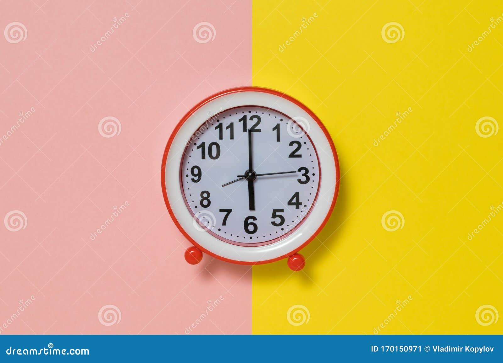 Clock with Hands on a Yellow and Pink Background. Stock Image - Image ...