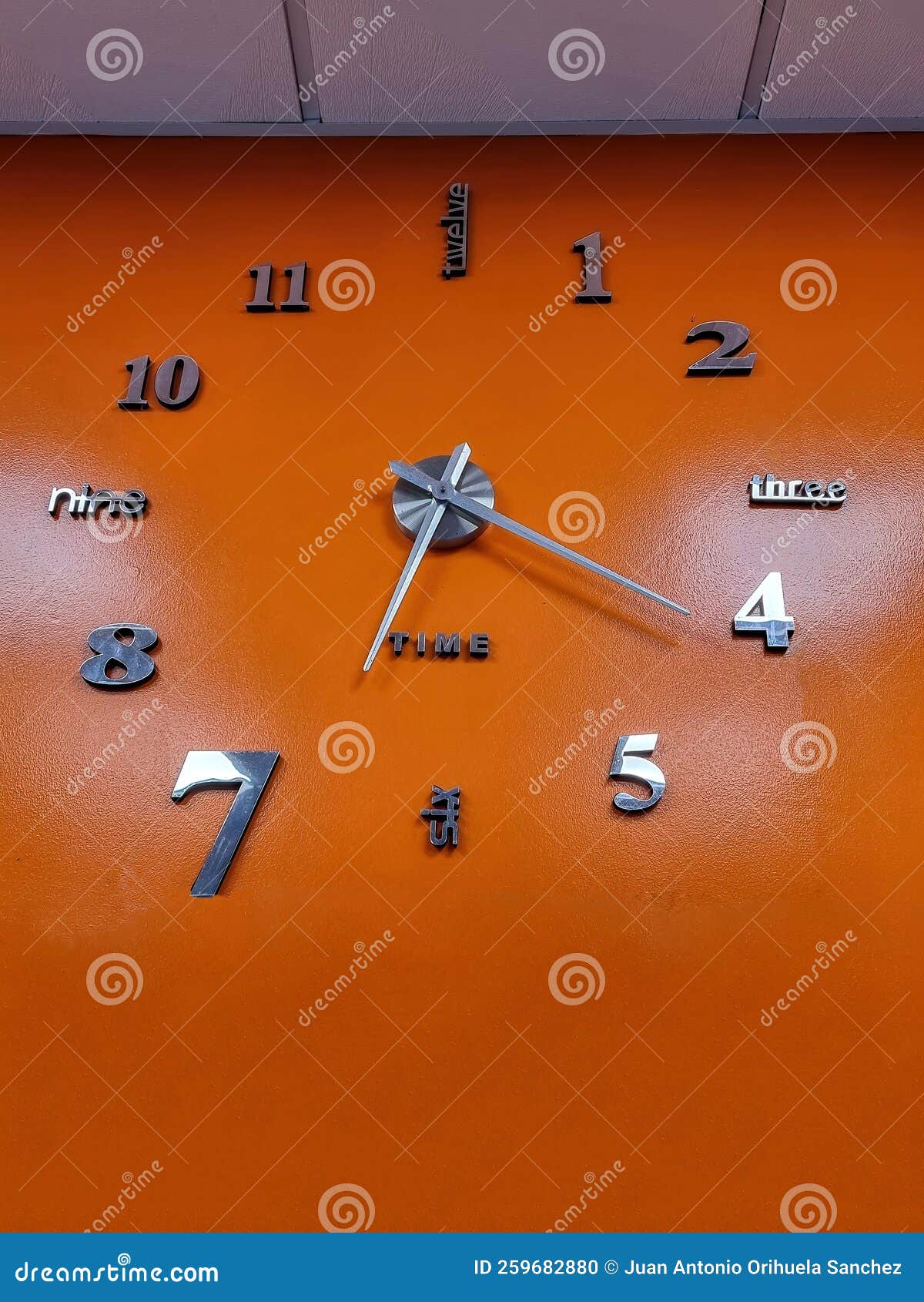 Clock Installed on an Orange Wall Editorial Image - Image of timer ...
