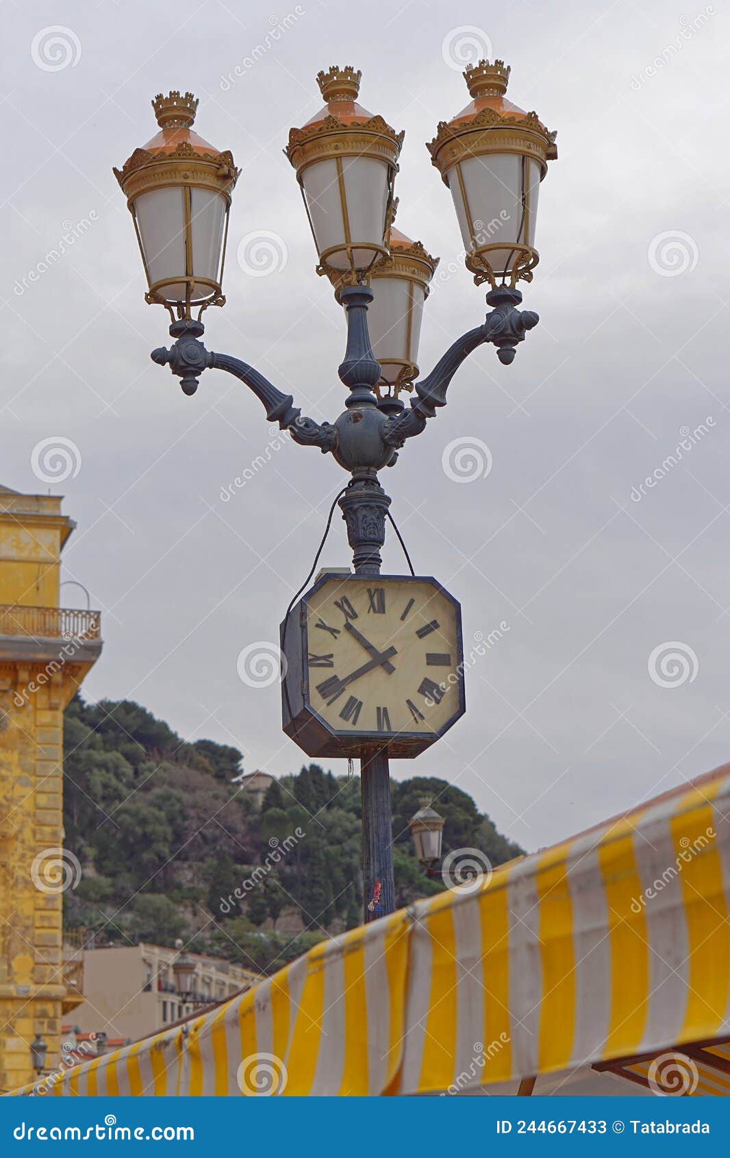 Clock light pole stock image. Image of landmark, nice - 244667433