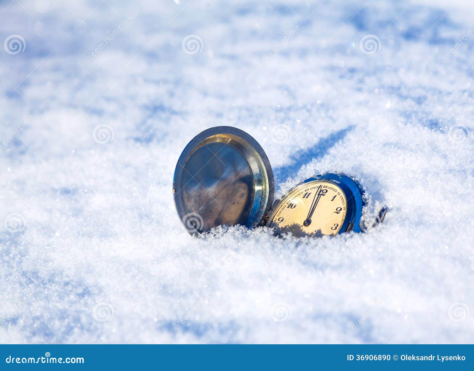 Clock lying in the snow stock photo. Image of snowdrift - 36906890