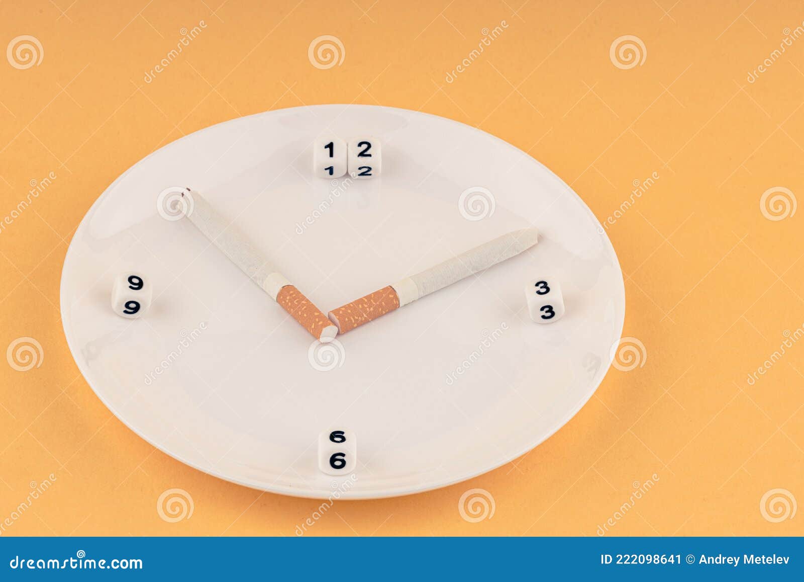 A Clock Made of Cigarettes and a Dial, a Plate and Cigarettes on it ...