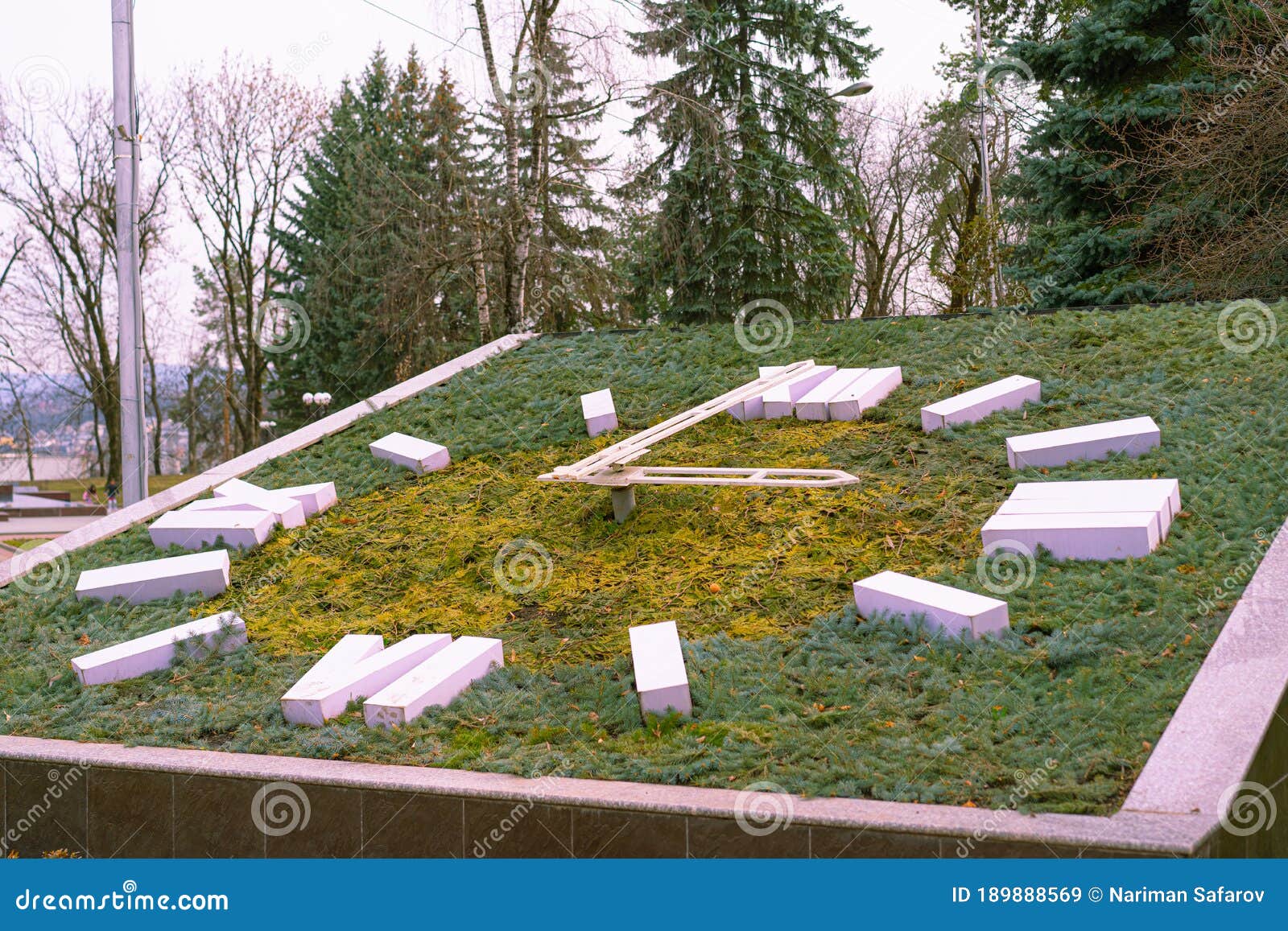 Clock made on the ground stock image. Image of time - 189888569