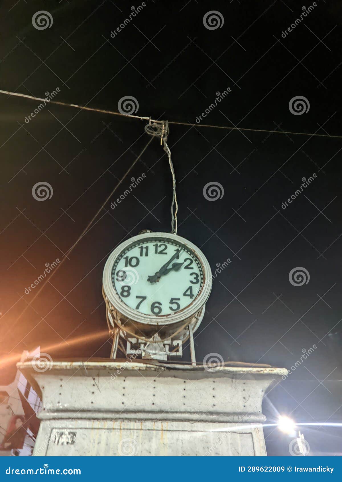 Clock at night stock image. Image of dark, time, number - 289622009