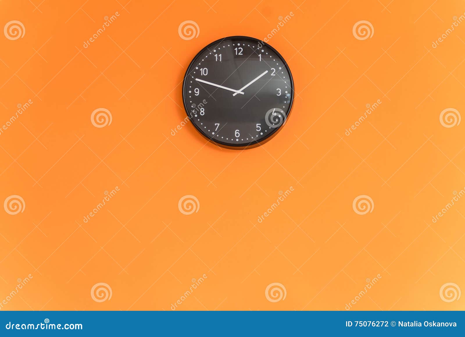 Clock on orange wall stock photo. Image of afternoon - 75076272