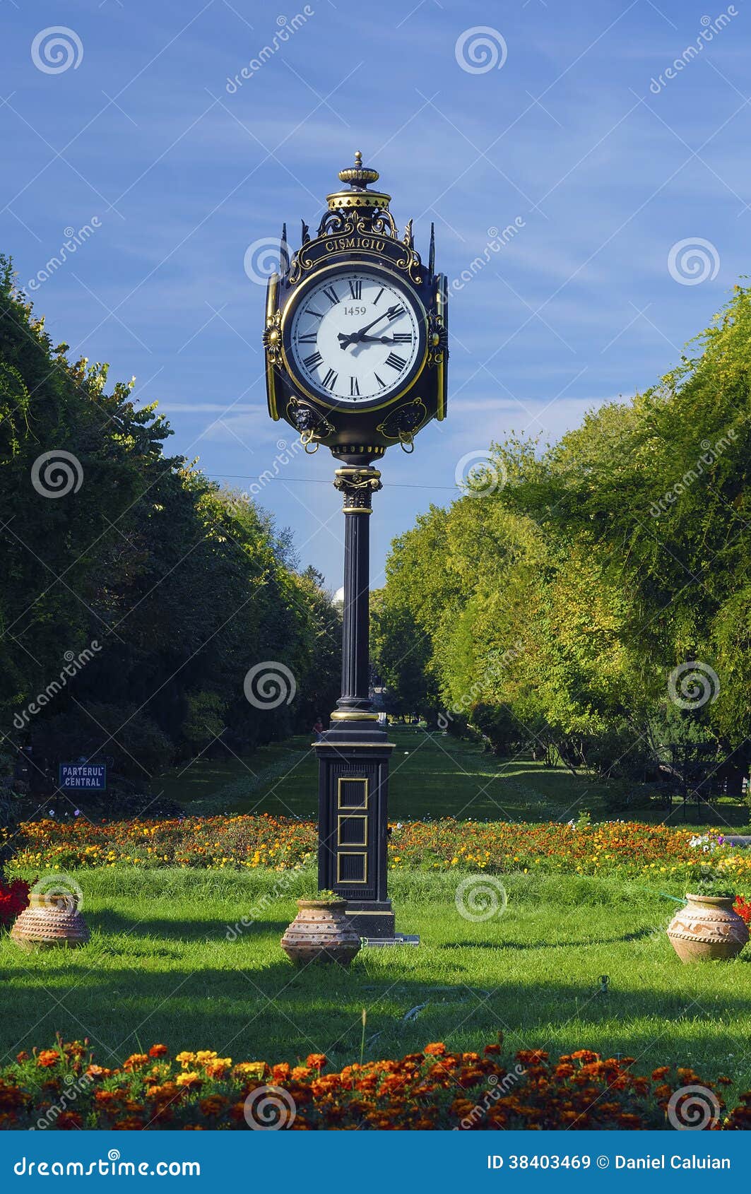 Clock in park stock image. Image of time, metal, grass - 38403469