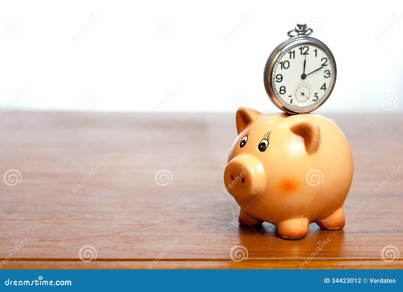 Clock on a piggy bank stock photo. Image of investment - 34423012