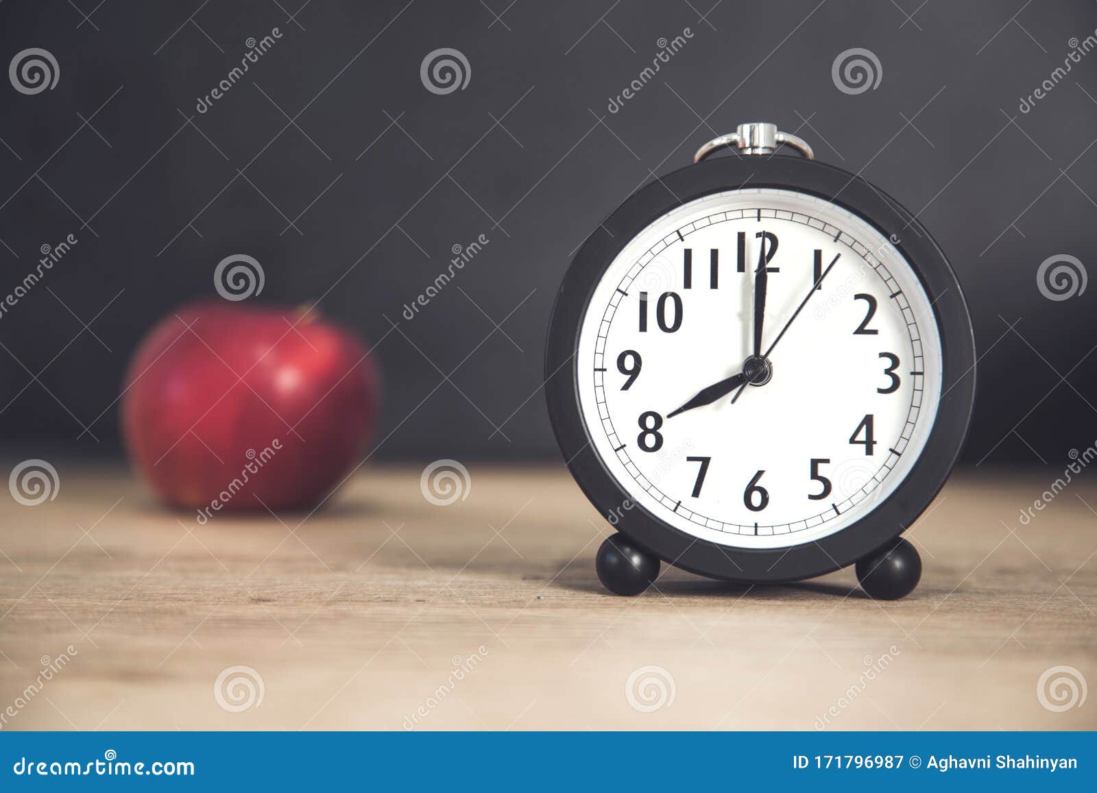 Clock with red apple stock image. Image of desk, alarm - 171796987