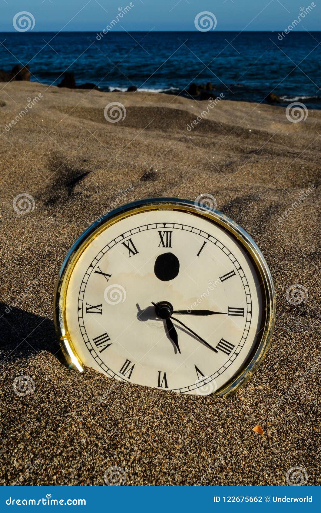 Clock on the Sand Beach stock photo. Image of timeline - 122675662