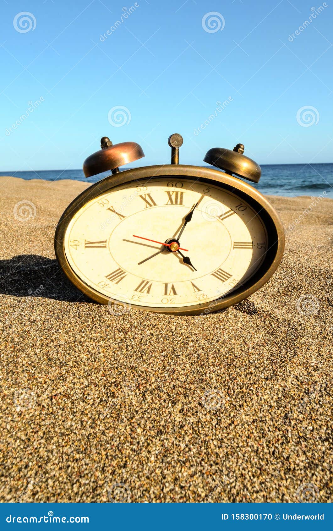 Clock on the Sand Beach stock photo. Image of symbol - 158300170