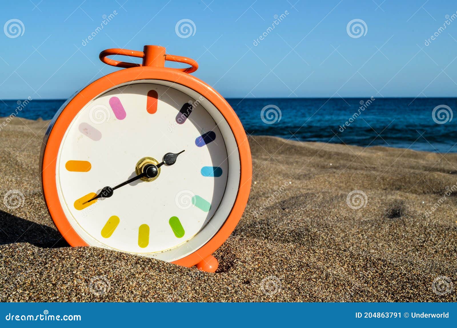 Clock on the Sand Beach stock image. Image of ocean - 204863791
