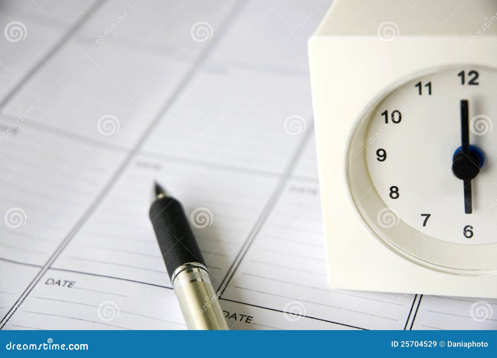 Clock on schedule planner stock image. Image of book - 25704529