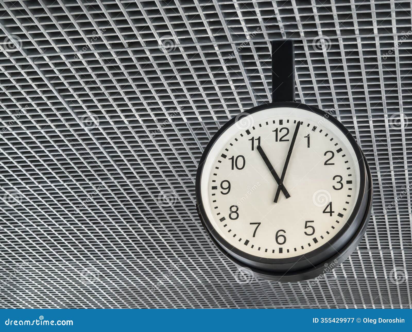 Wall Clock Displaying 12 O Clock in a Modern Indoor Space with a Grid ...