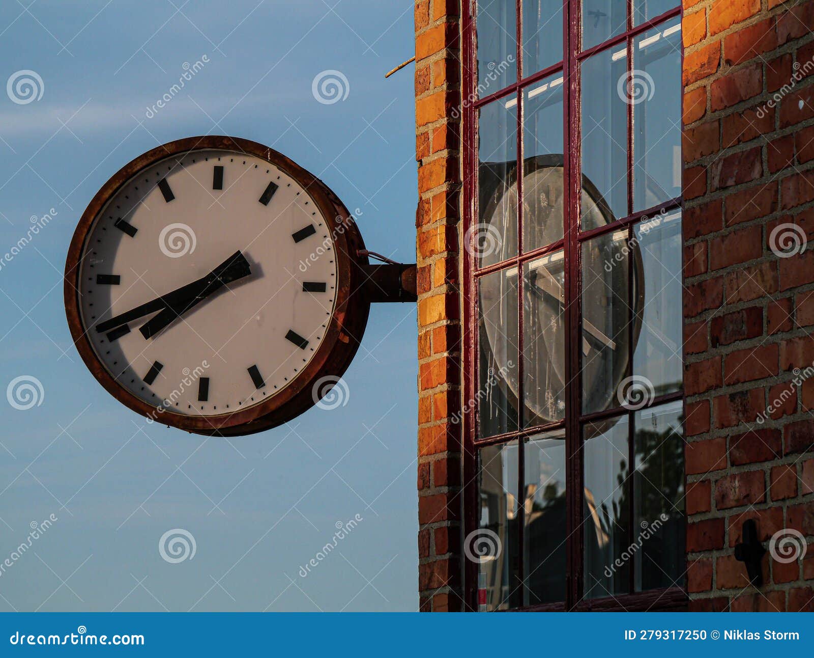 A Clock on the Side of a Building Stock Photo - Image of facade ...