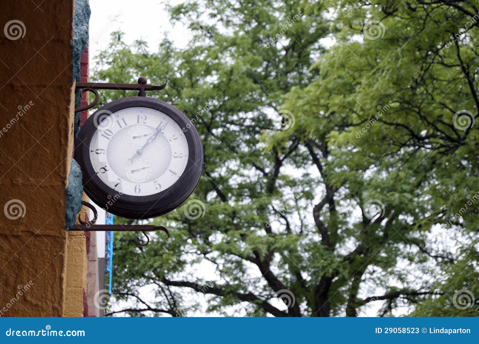 Clock on Side of Building stock image. Image of face - 29058523