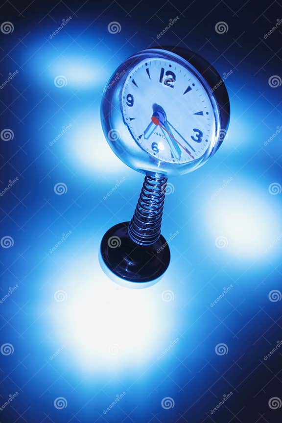 Clock on Spring Stand stock photo. Image of punctual - 22369448