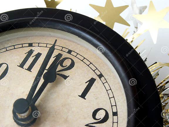 The clock strikes midnight stock image. Image of analog - 384859