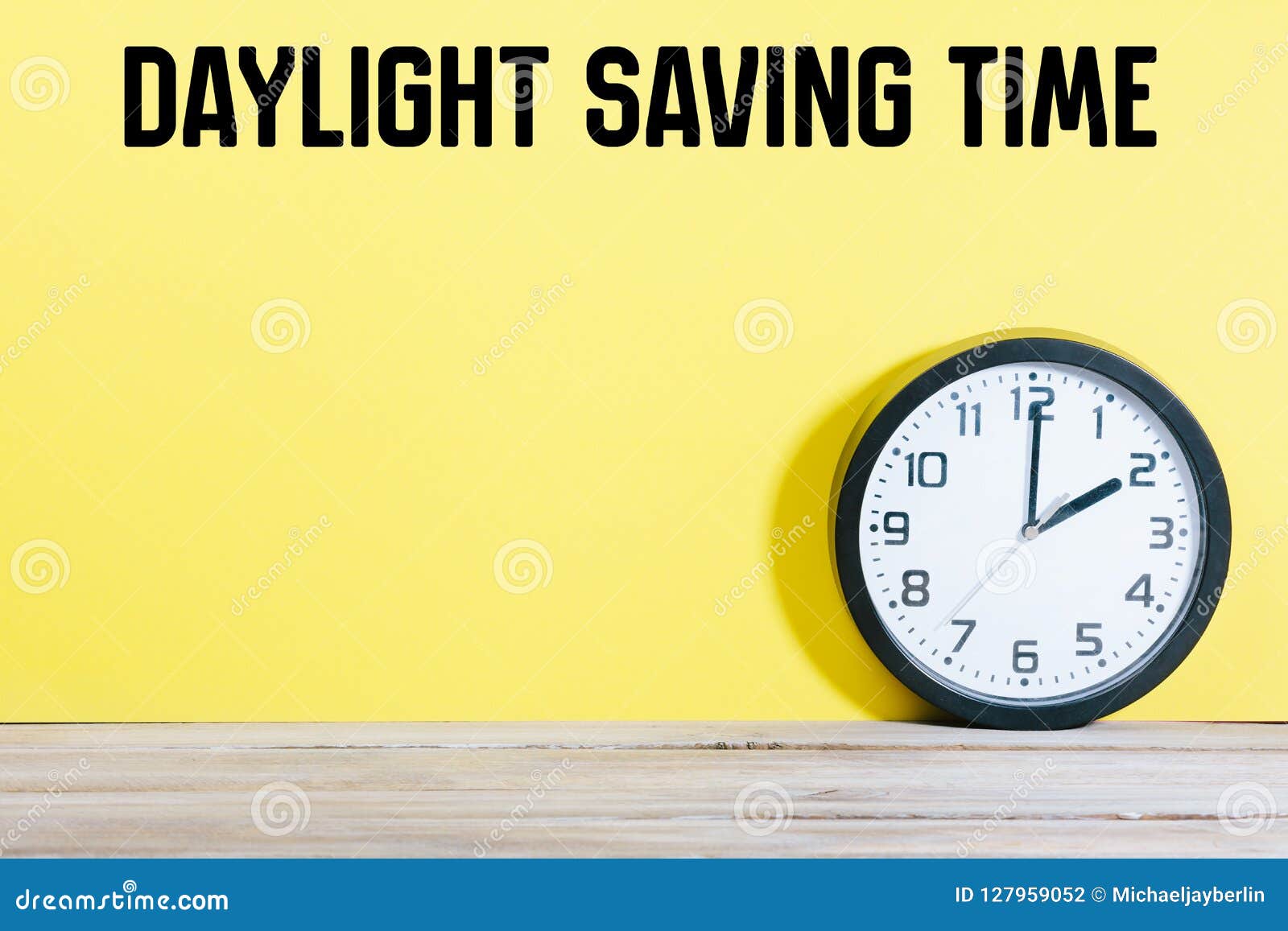 Clock on Table with Daylight Saving Time Message Stock Photo - Image of ...