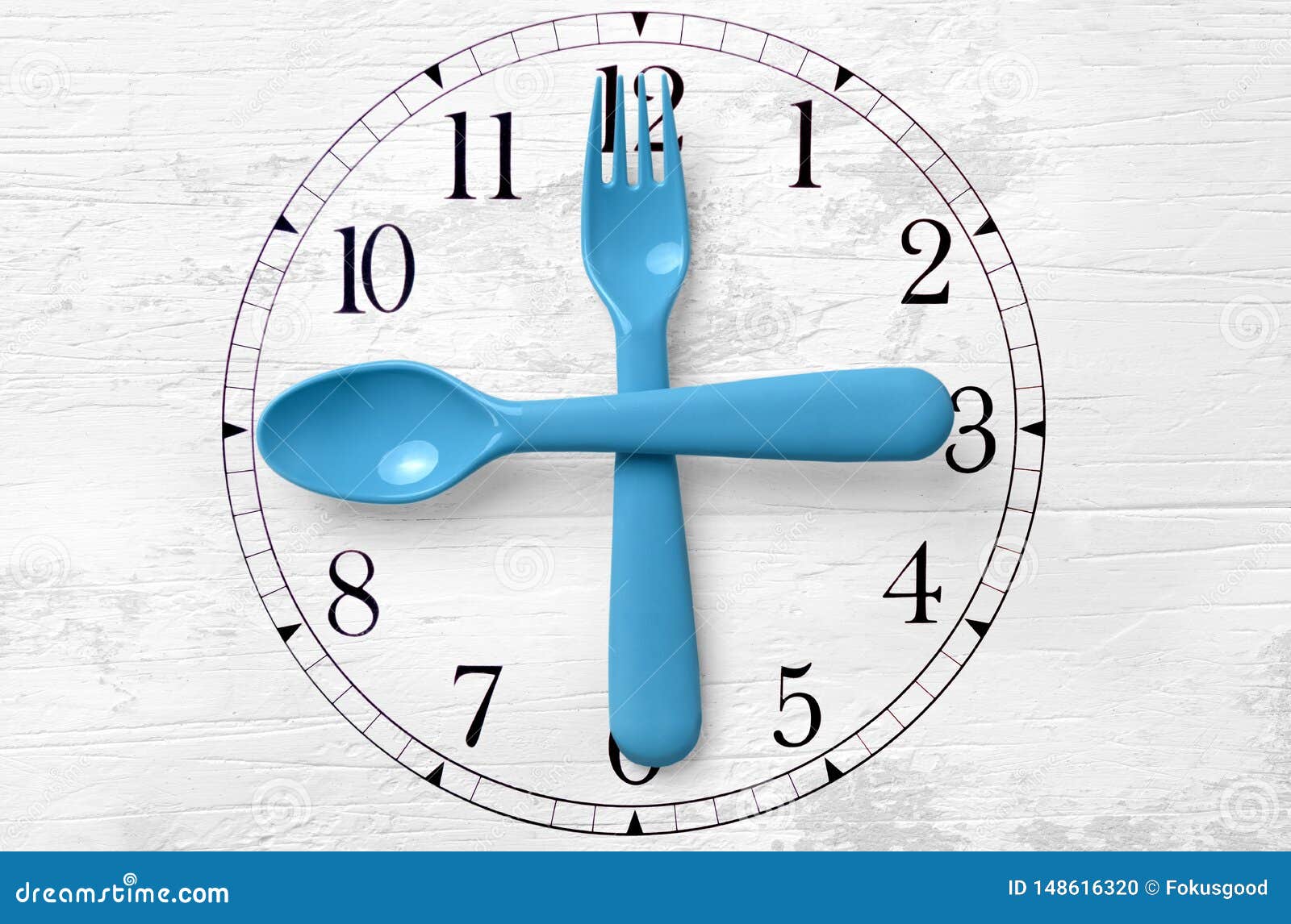 Clock on Table with Hands Fork and Spoon Stock Photo - Image of dinner ...
