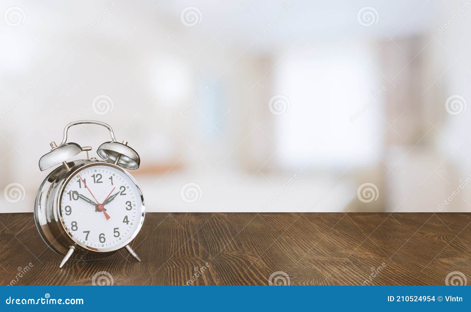 Clock on table stock photo. Image of hour, metal, furniture - 210524954