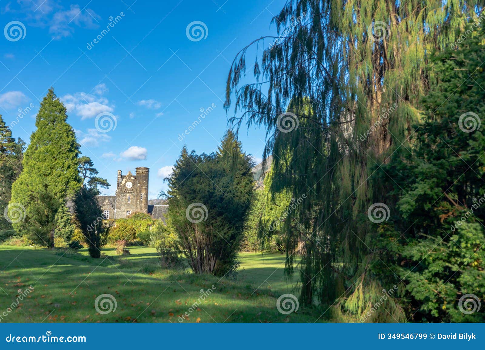 A Clock Tower from Benmore Botanic Gardens, Scotland. Stock Image ...