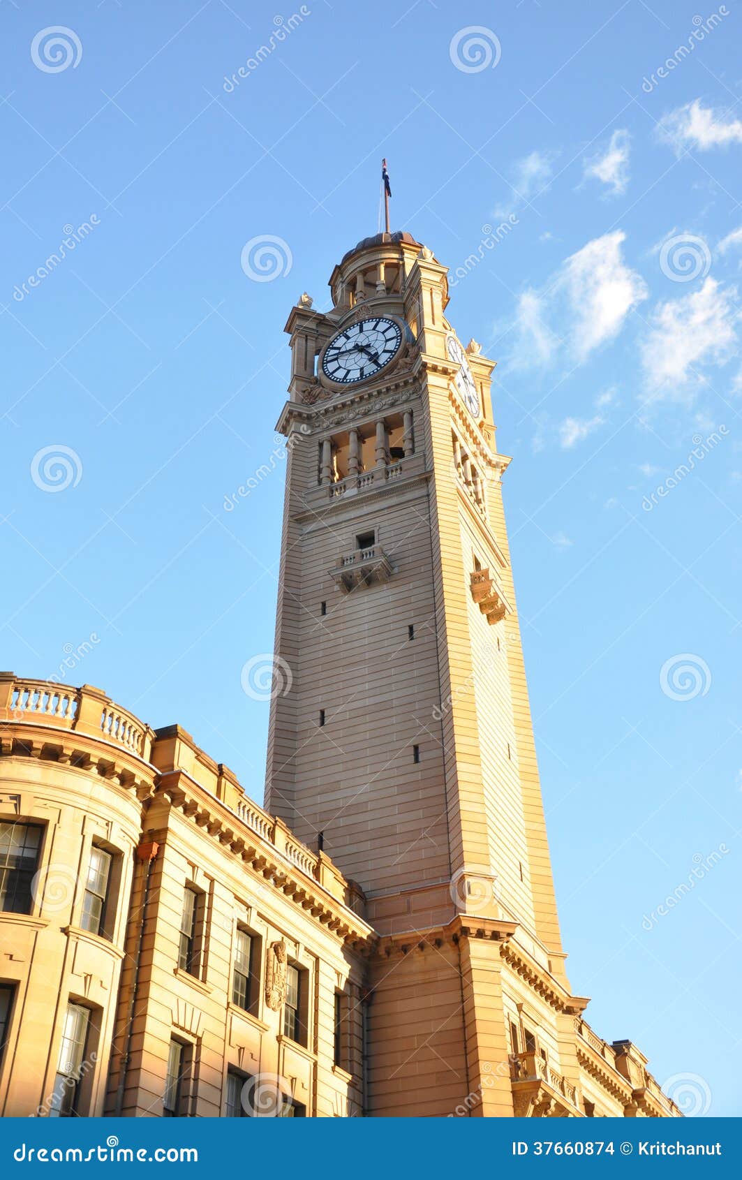 Clock Tower Building Against Blue Sky Background Stock Photo - Image of ...