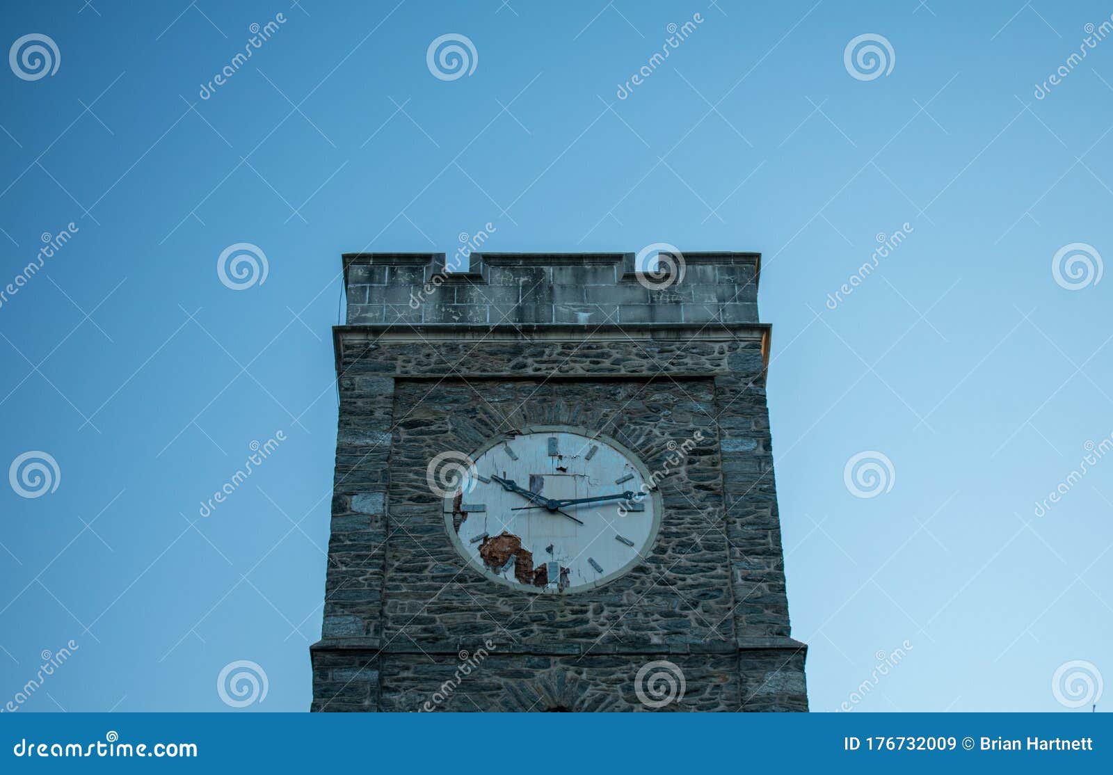 A Cobblestone Clock Tower on a Blue Sky Stock Image - Image of outdoors ...