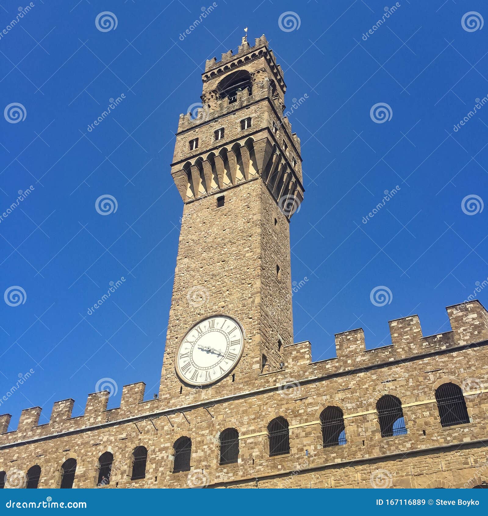 Clock Tower and Embattlements on Palazzo Vecchio in Florence Stock ...