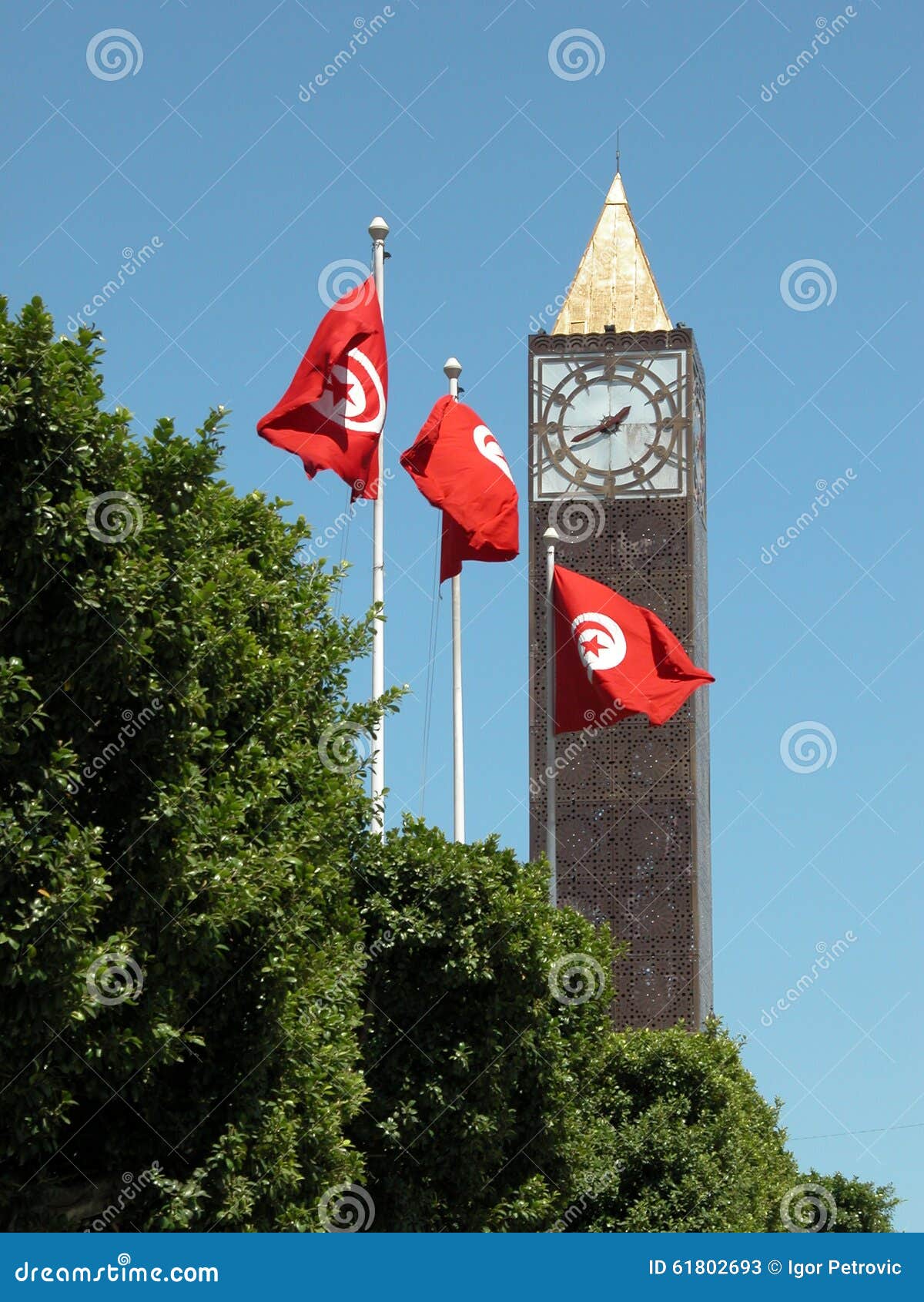Clock tower and flags stock image. Image of flag, arch - 61802693