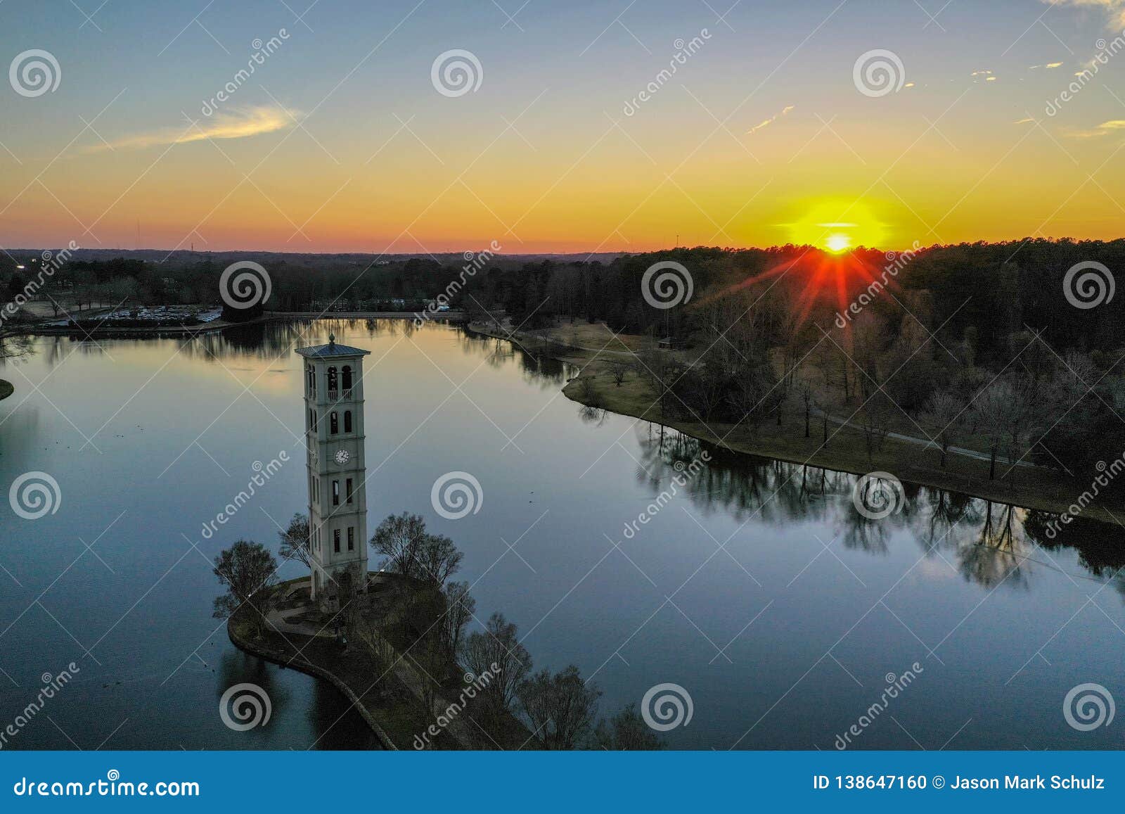 Clock tower on Furman Lake stock photo. Image of university - 138647160