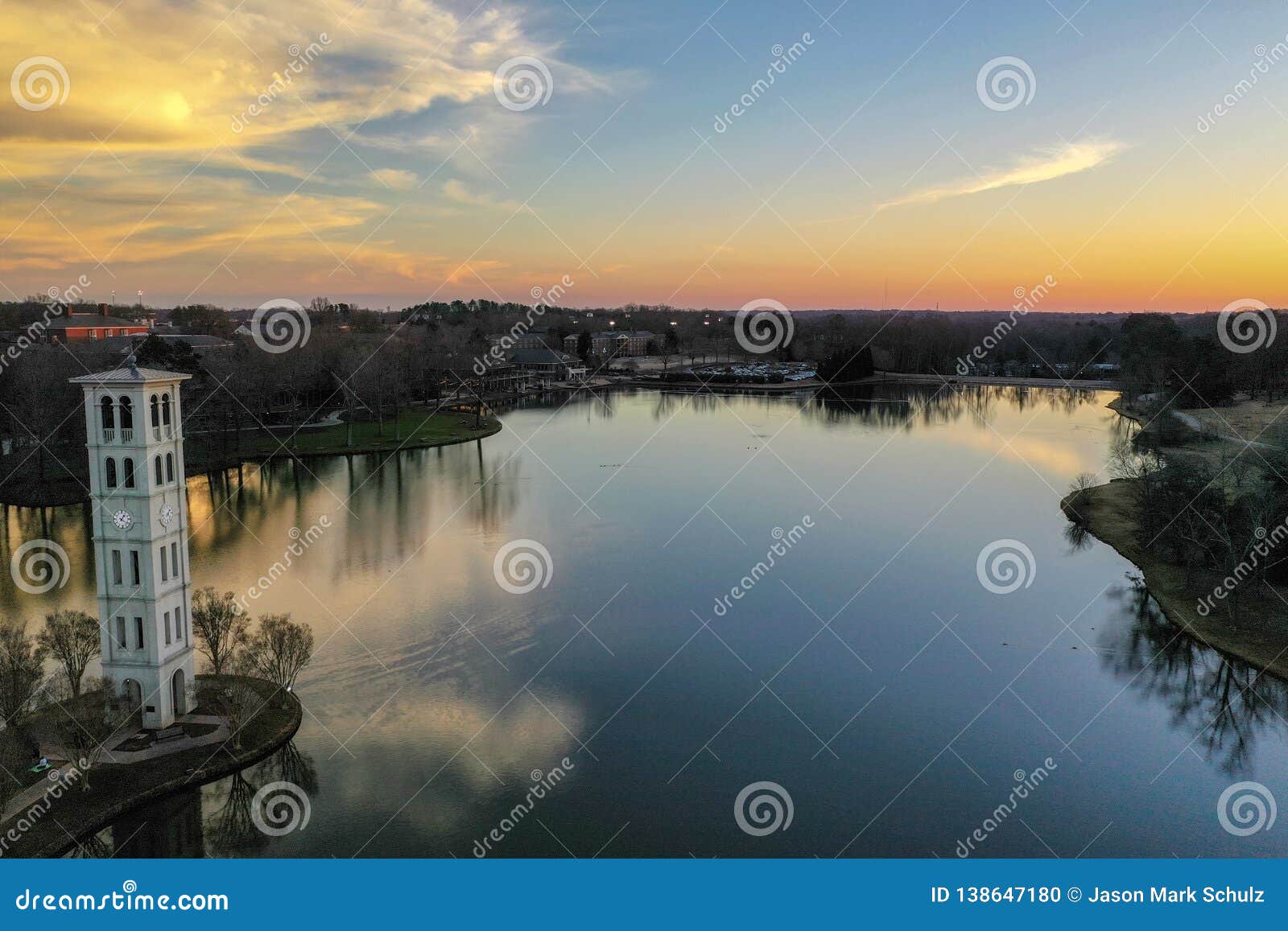 Clock tower on Furman Lake stock photo. Image of university - 138647180