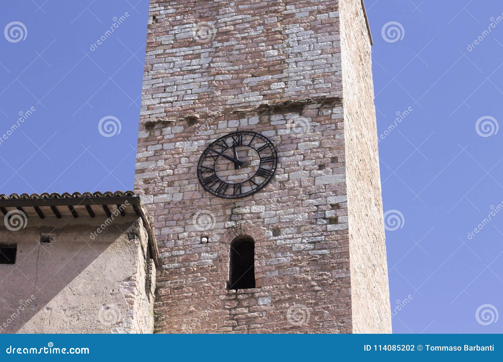 Clock Tower with an Isolated Window Stock Photo - Image of bricks ...