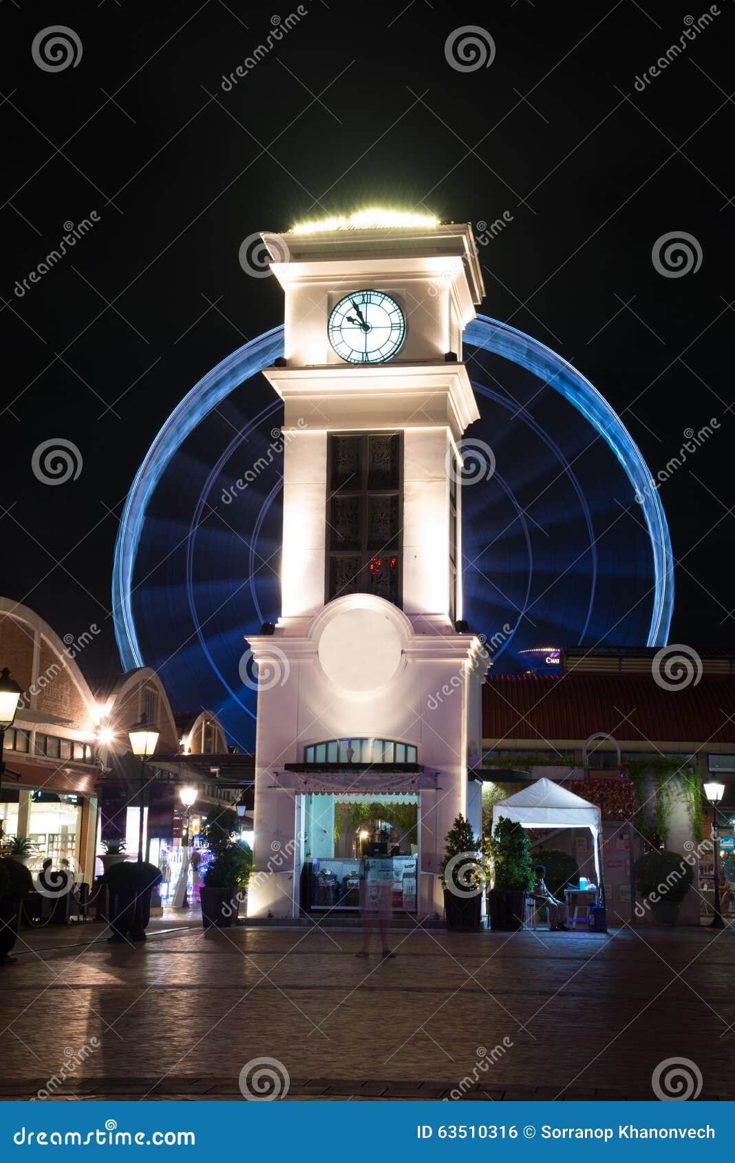 Clock tower at night stock photo. Image of wheel, night - 63510316