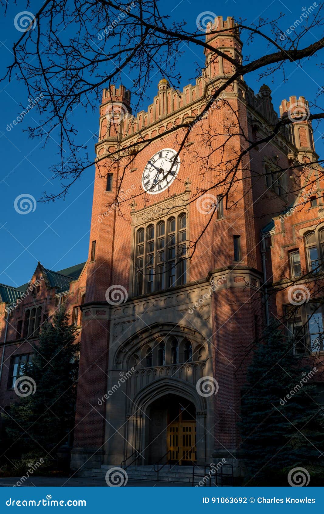 Clock Tower of a University Administration Building Sunlit Stock Photo ...
