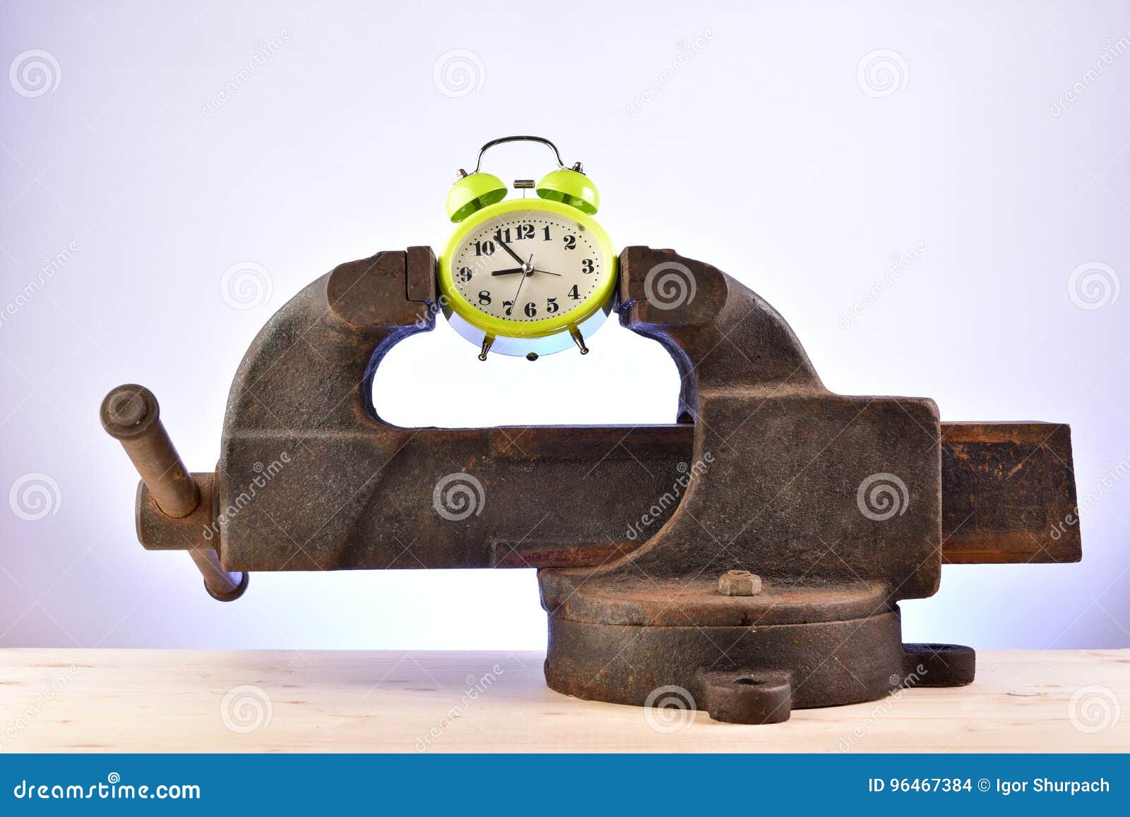 Clock in a vice stock photo. Image of deadlines, steel - 96467384