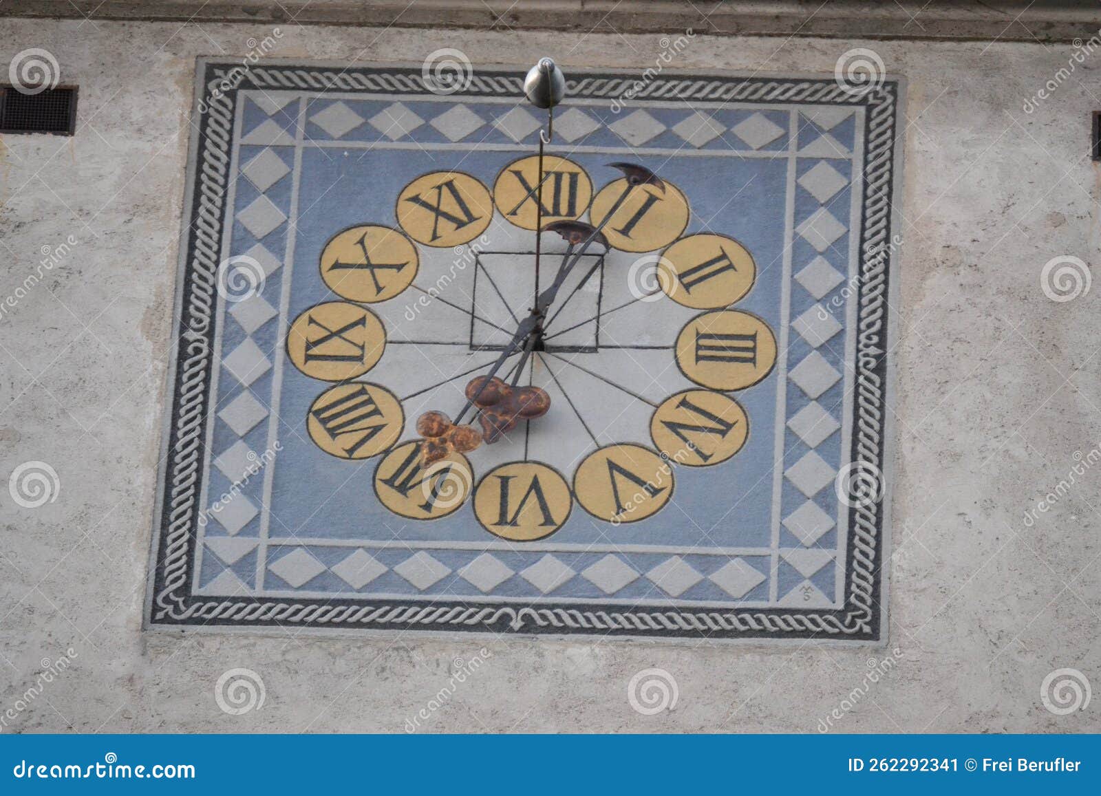 Clock on Wall with Roman Numerals Blue Background Golden Numerals Stock ...