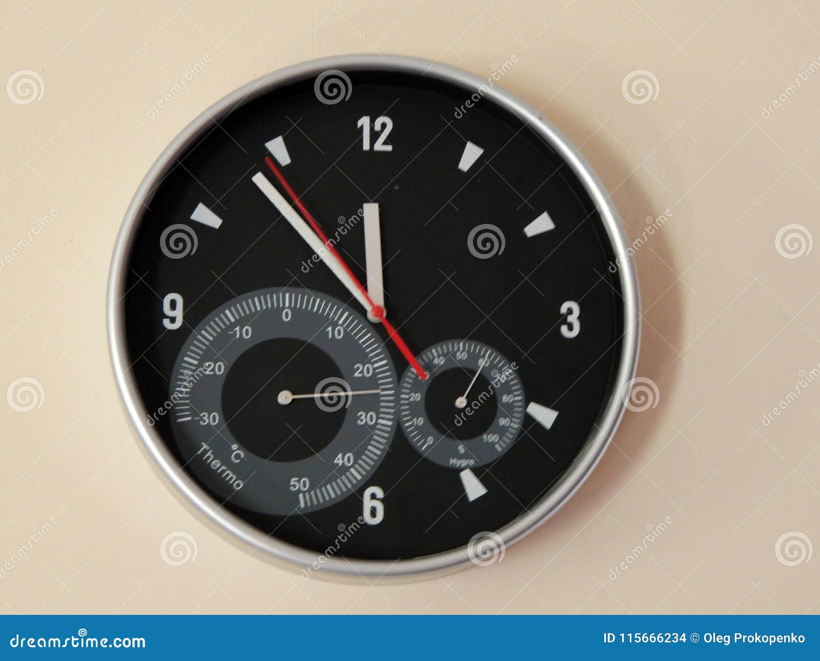 The Clock on the Wall Shows the Time Stock Photo - Image of time ...