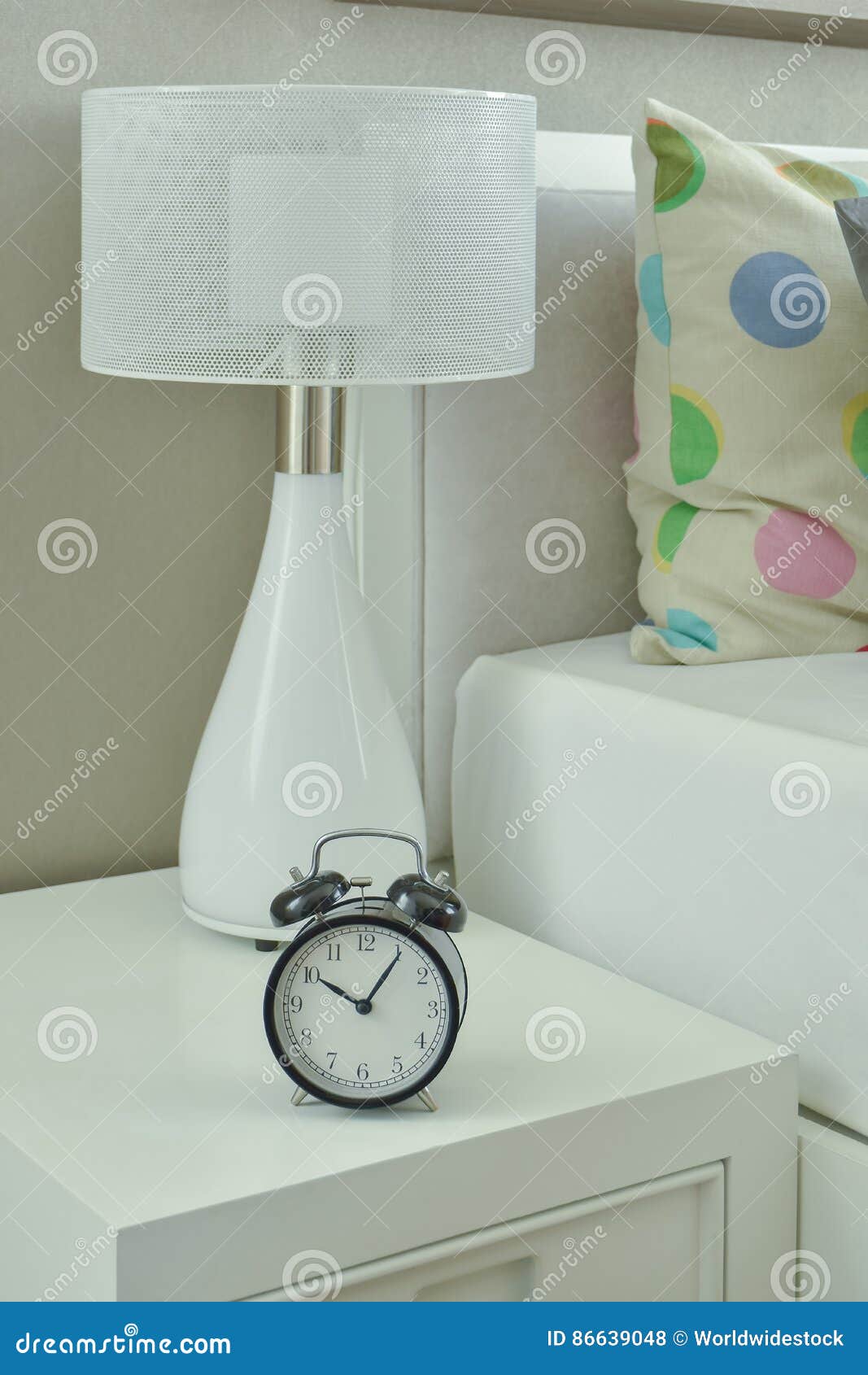 Clock and White Lamp on Bedside Table in Living Room Stock Photo ...