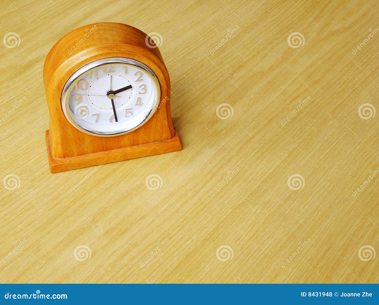 Clock on wood table stock photo. Image of space, numeral - 8431948