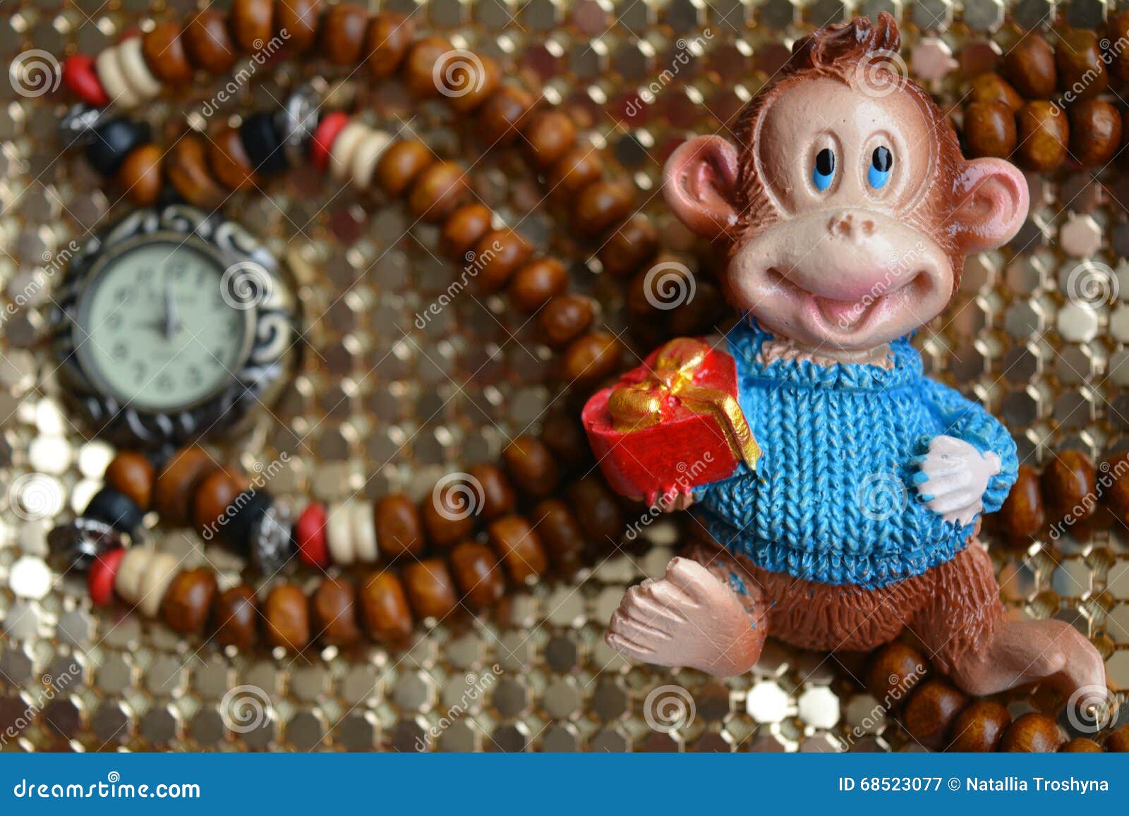 Clock with Wooden Beads and Decorative Monkey Stock Image - Image of ...