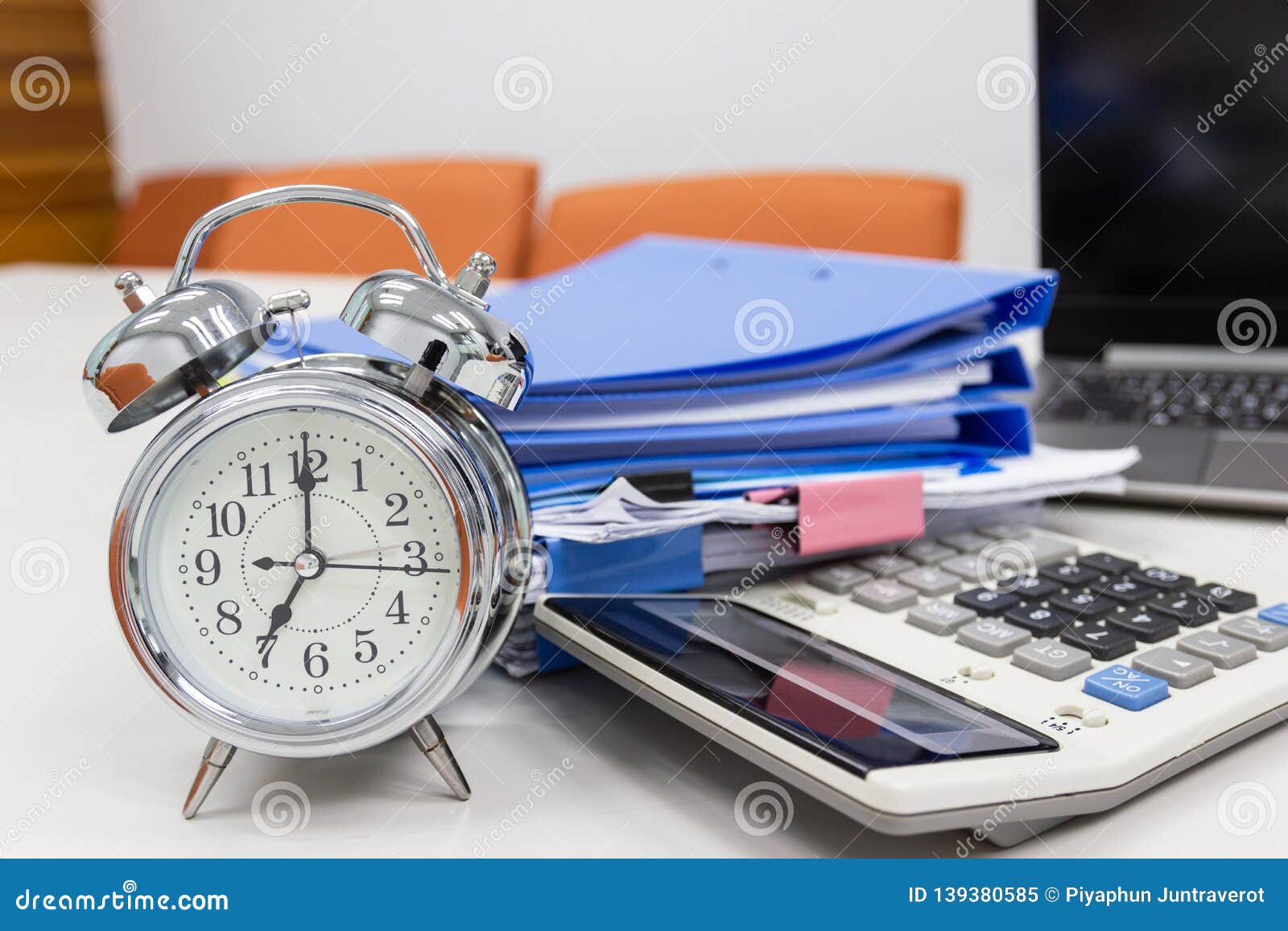 Clock on Work Desk with Calculation, Docutment in the Work Office Time ...