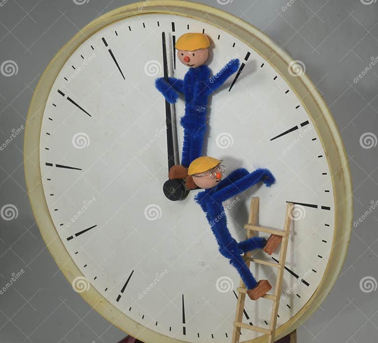 Clockmen Adjusting a Clock To or Back from Daylight Saving Time Stock ...
