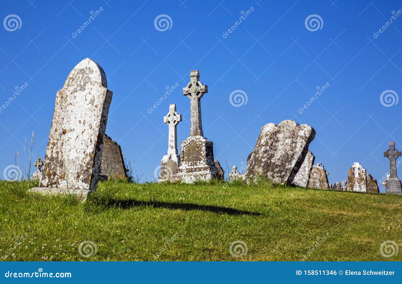 Clonmacnoise Cathedral with the Typical Crosses and Graves Stock Photo ...